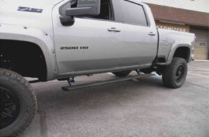 Custom Upfitted & Lifted Trucks - Customizers Quality Conversions